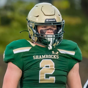 Joseph Momo Mills' Bishop Feehan High School Career Home