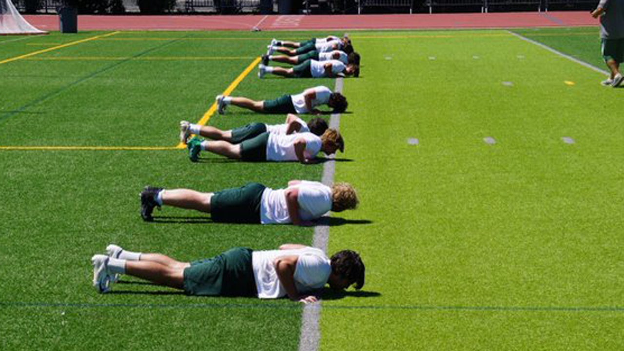 High school football conditioning met with excitement, challenges